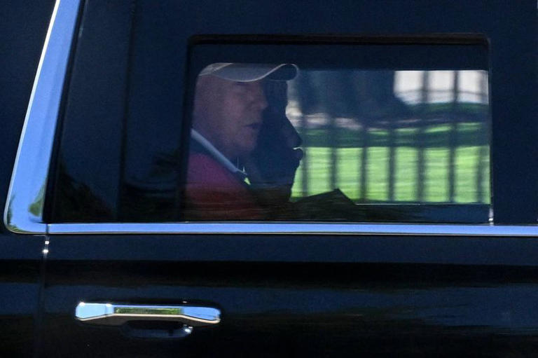Donald Trump rocks up at golf course with mystery blonde aide after ranting