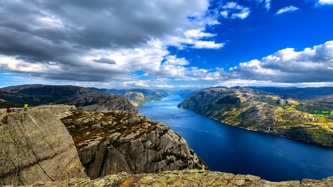 Dramatic mountain vista featuring a deep fjord valley