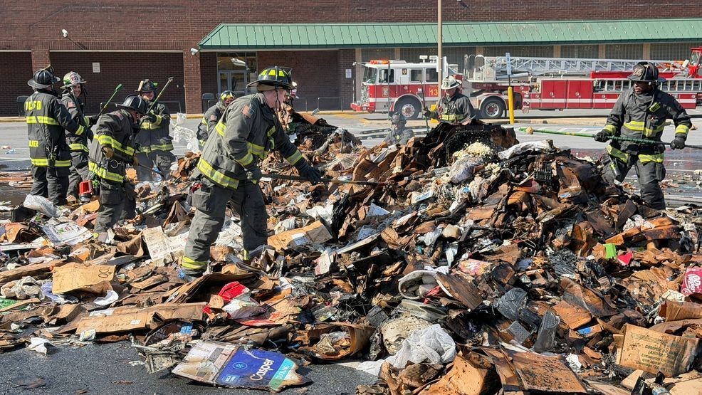 Trash truck load catches fire in Northeast DC