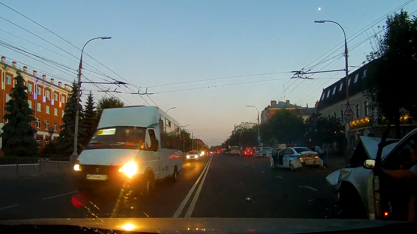 Driver hits police car