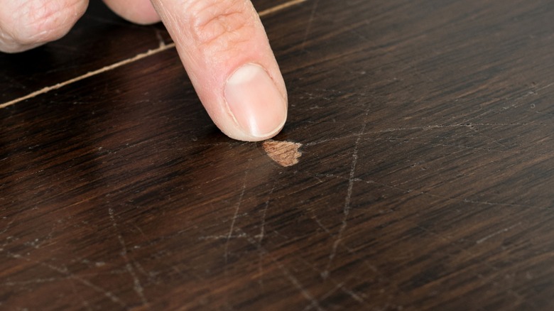 Not paint: The easy way to fix scratched or chipped kitchen cabinets