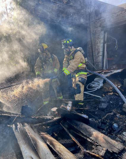 Flames destroy Canton building, 1 firefighter suffers minor injuries