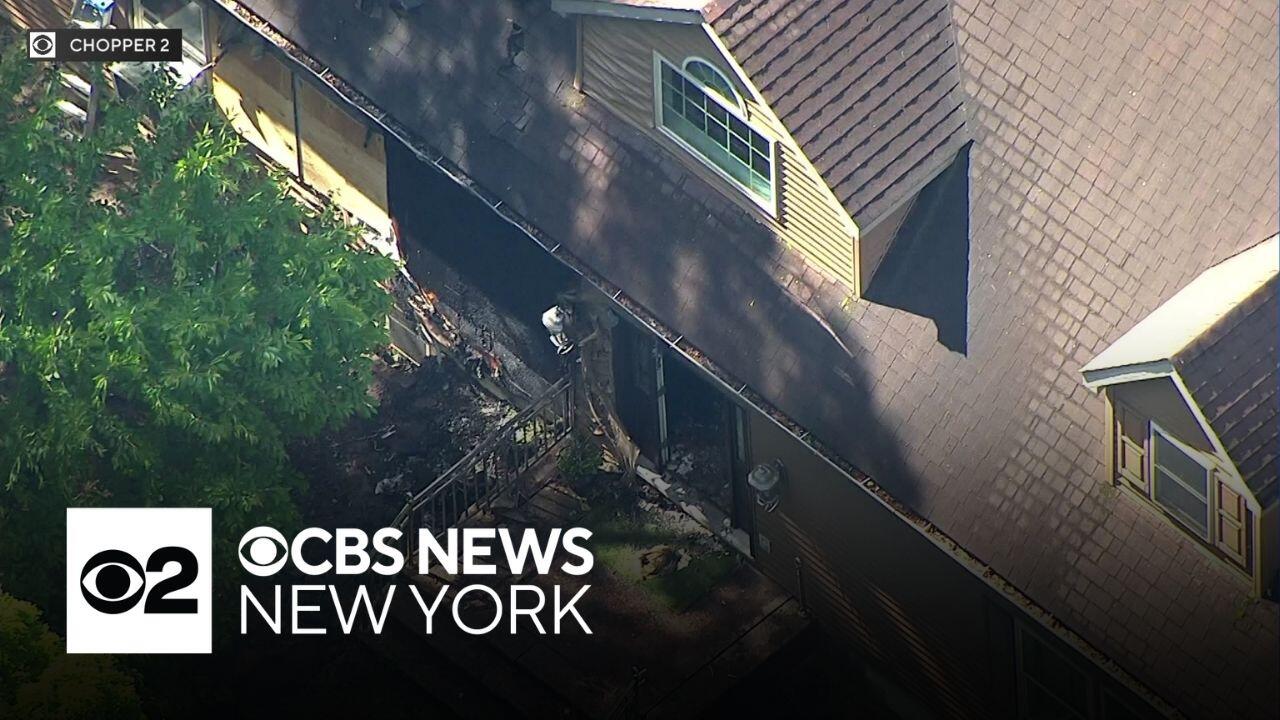 Minivan bursts into flames after crashing into house on Long Island