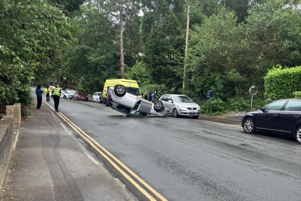 Car flips onto roof after clipping another vehicle in Bournemouth