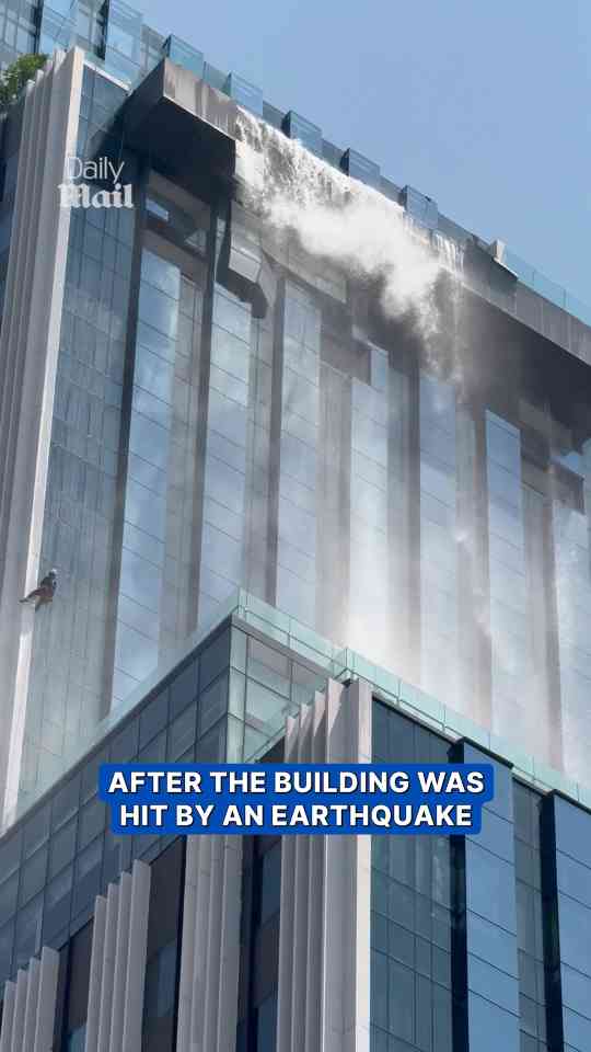 Window cleaner left dangling from skyscraper during earthquake scare