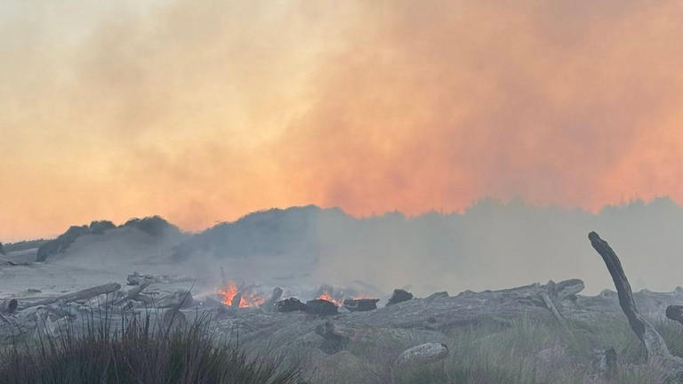 Half Moon Bay fire near Winchester Bay contained, crews mop up hot spots