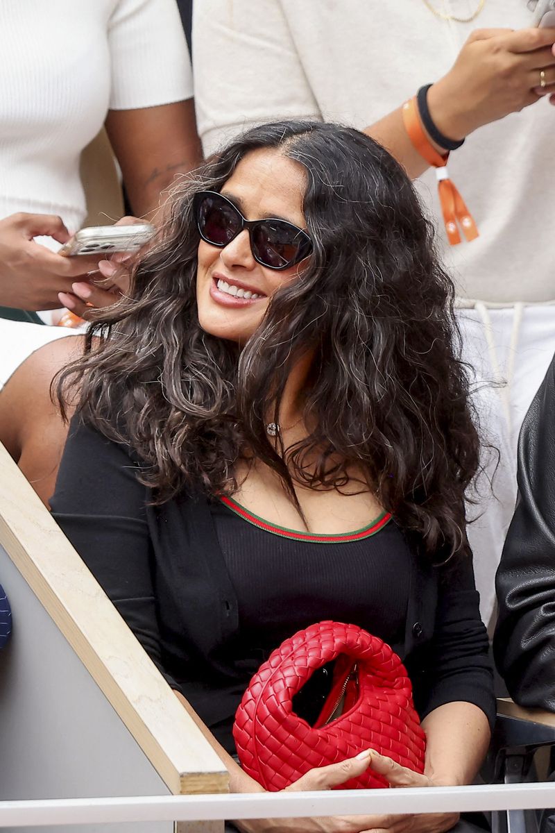 Salma Hayek brings back the newsboy-style cap while enjoying the French ...