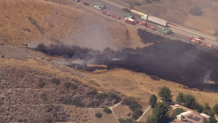 Forward progress stopped on Castaic brush fire that burned close to homes