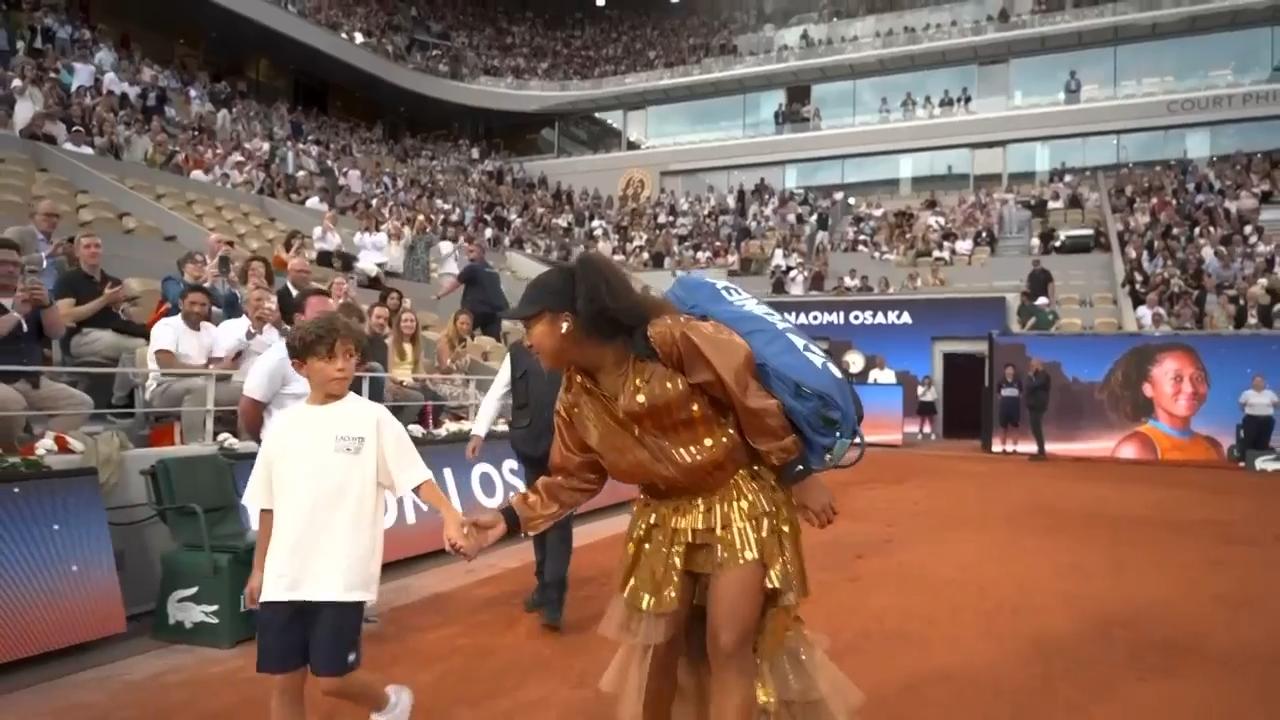 Moment: Sequins and gold train, Osaka unveils latest French Open outfit