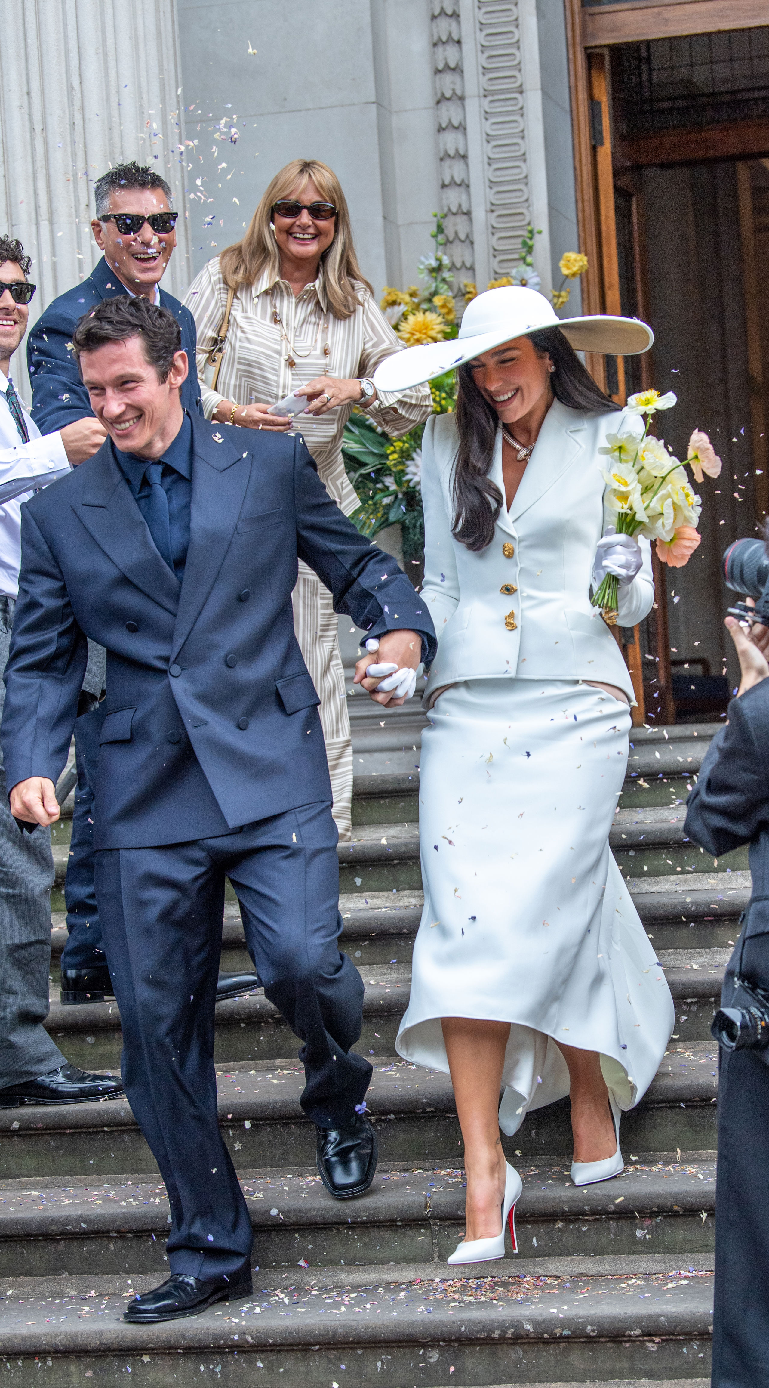 Dua Lipa marries Callum Turner in a Bianca Jagger-inspired bridal suit ...