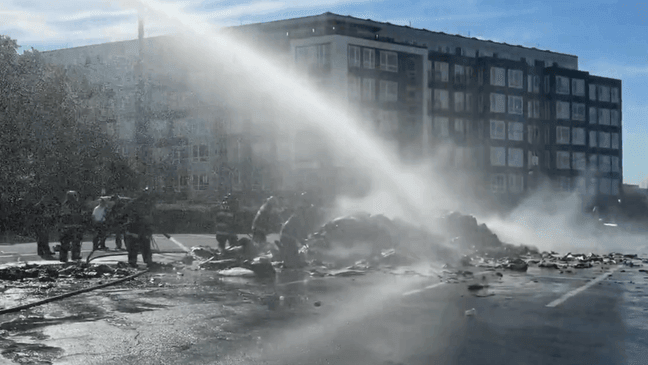Trash truck load catches fire in northeast DC