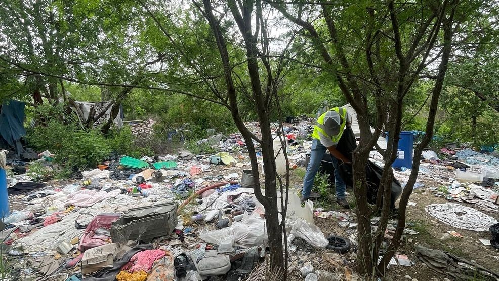 Abandoned homeless camp cleaned up by jail diversion volunteers