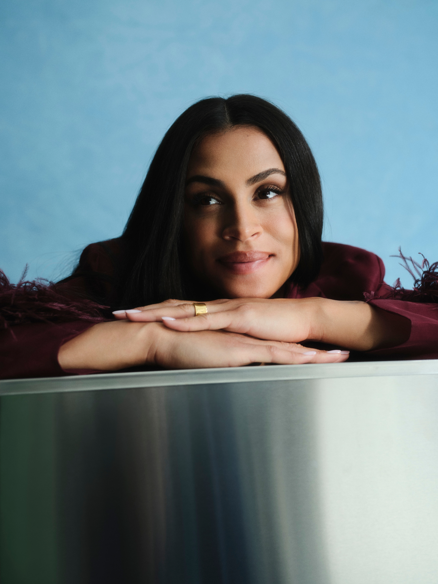 Track star and mom-to-be Sydney McLaughlin-Levrone glows in FN cover shoot