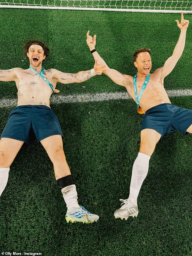 Shirtless Olly Murs shows off his ripped physique to celebrate raising ...