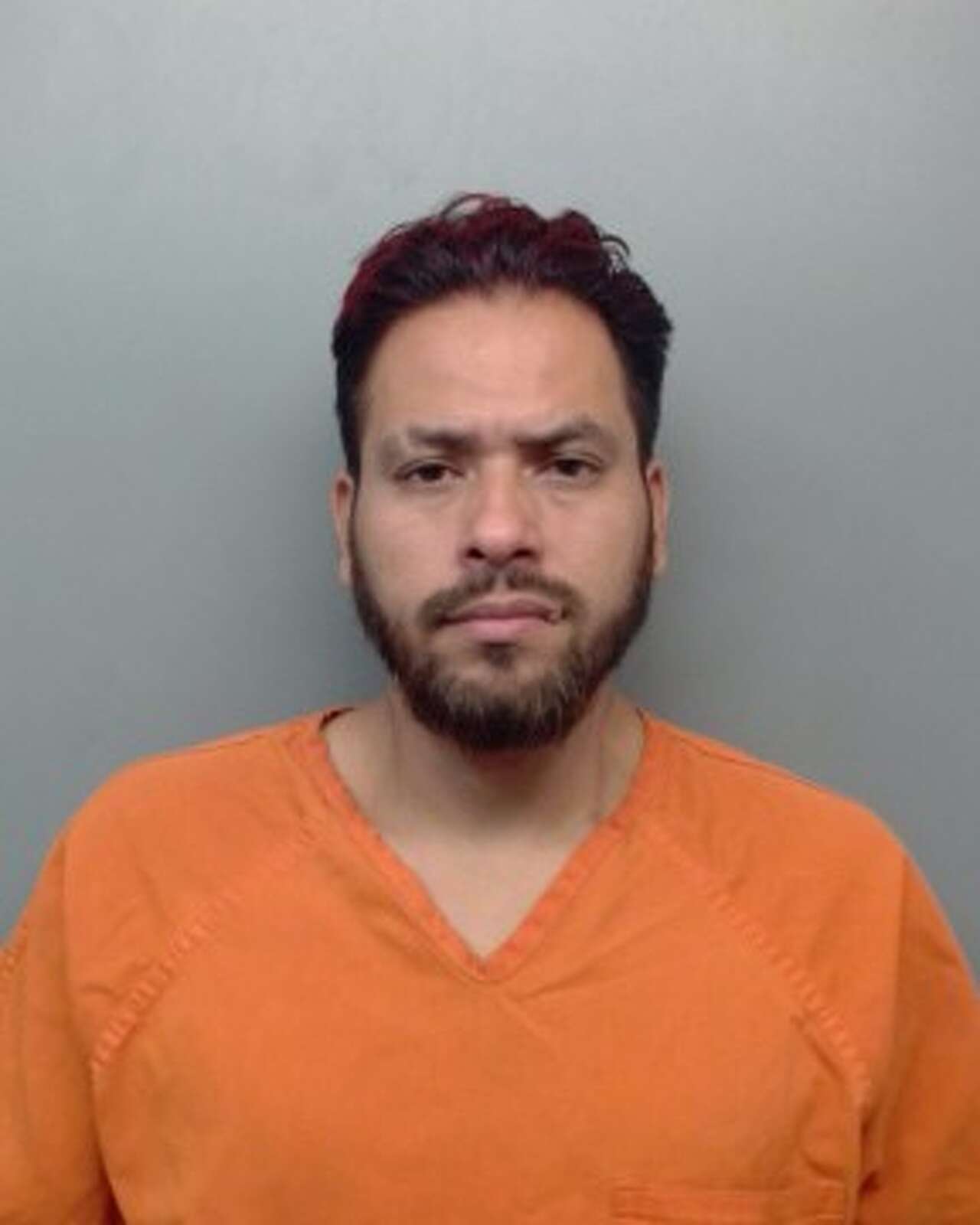 Man arrested after pointing rifle at several people following altercation