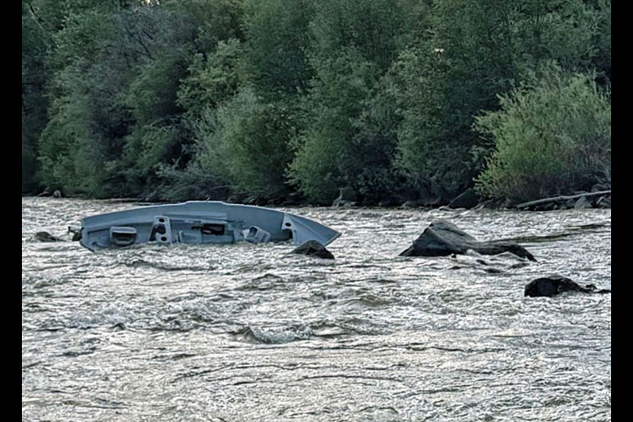 3 fishermen rescued after fishing boat capsizes in Fall River