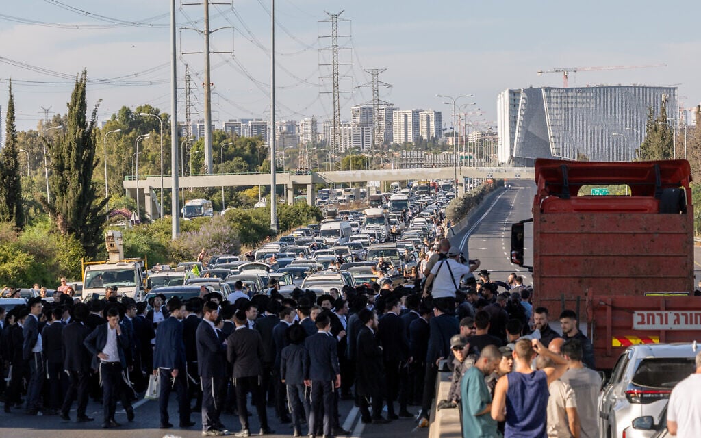 Mass ultra-Orthodox protests block roads, halt traffic over arrest of ...