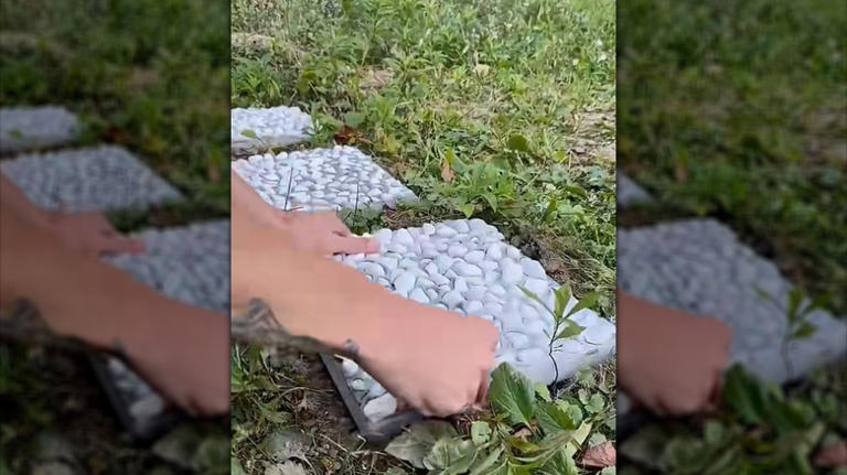 Use an old pebble collection to DIY budget-friendly pavers in the garden