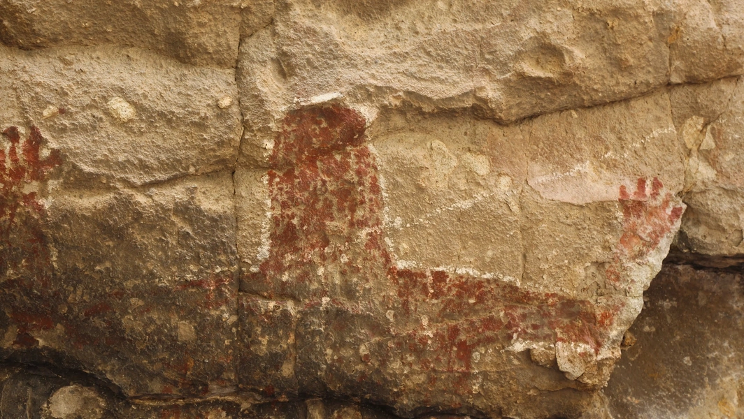 Striped rock in Wales confirmed as UK's oldest cave art