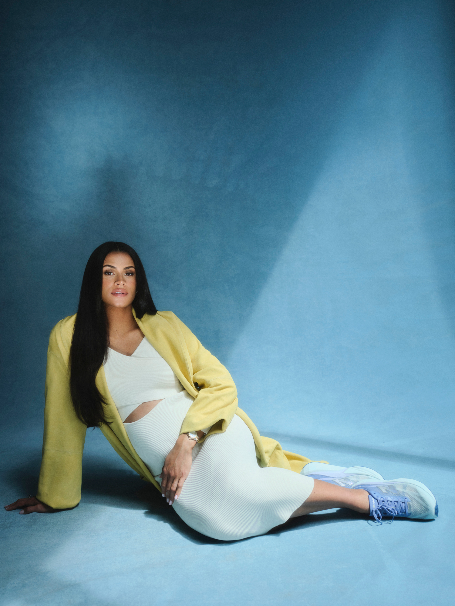 Track star and mom-to-be Sydney McLaughlin-Levrone glows in FN cover shoot