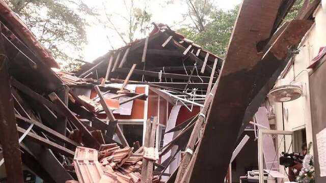 Roof of school campus building collapses on school opening day, no injuries
