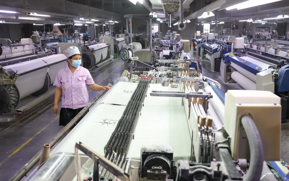 China's private factory gauge beats forecasts as official PMI stalls