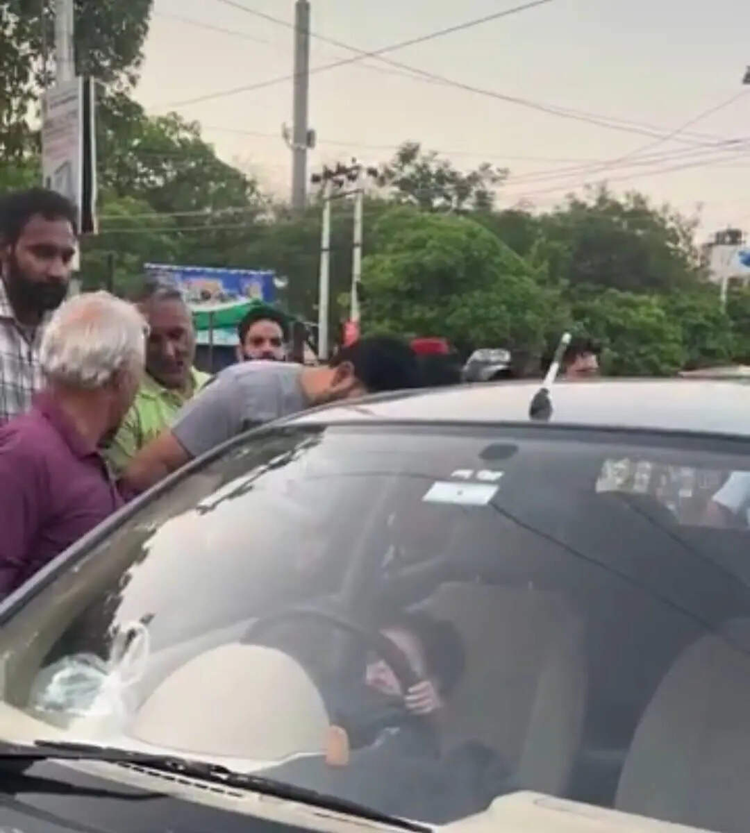 Toddler rescued after getting locked inside car