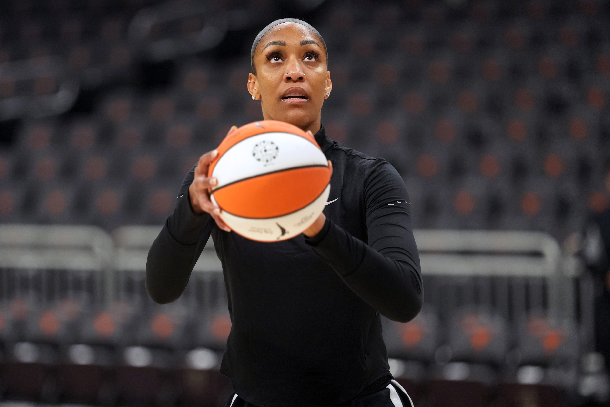 Young, Wilson close late as Aces win 84-79 for first home win