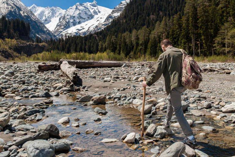 Where carrying a firearm on a hiking trail can be restricted