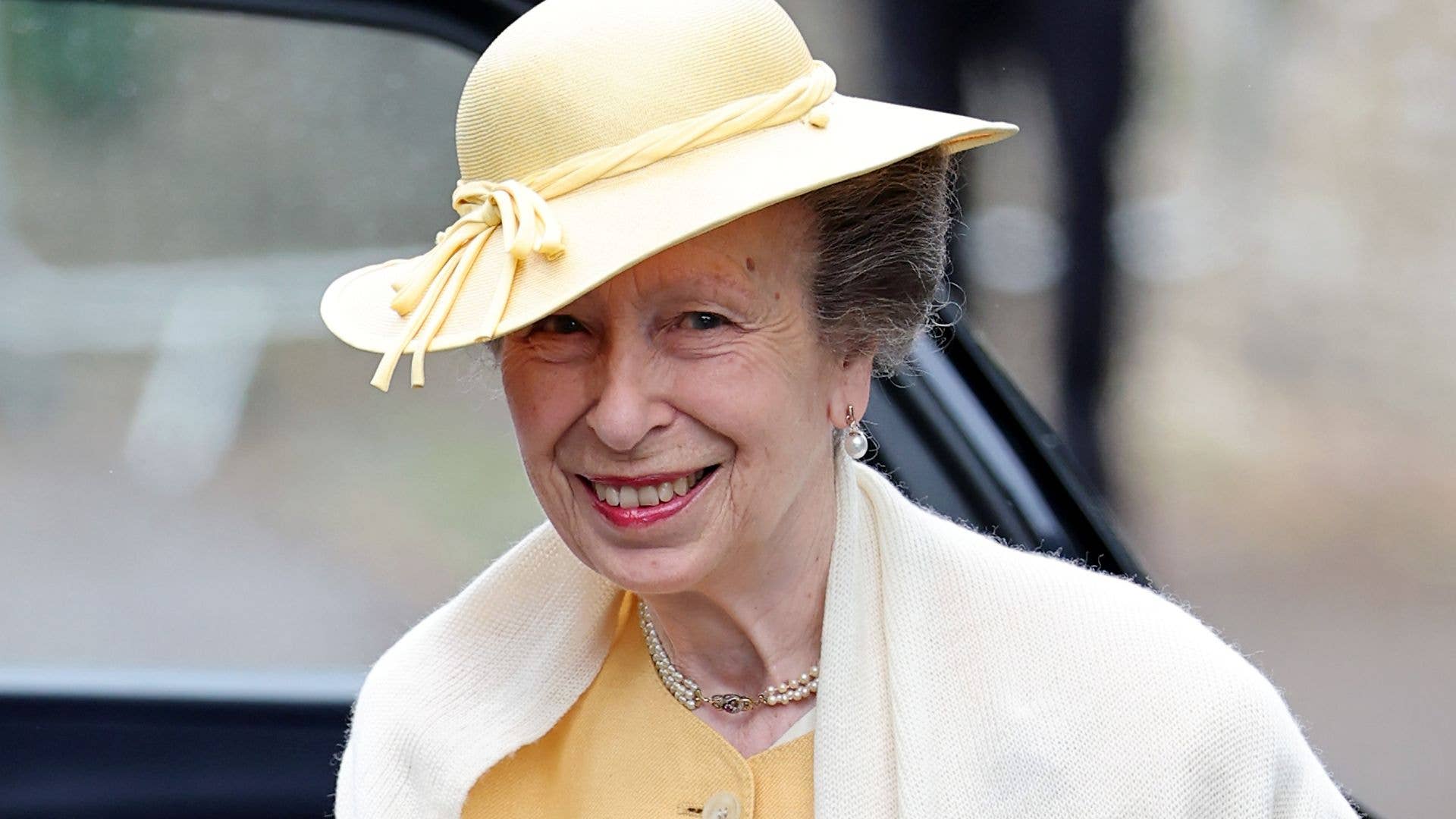 Princess Anne radiates joy in vintage yellow for son Peter Phillips’s ...