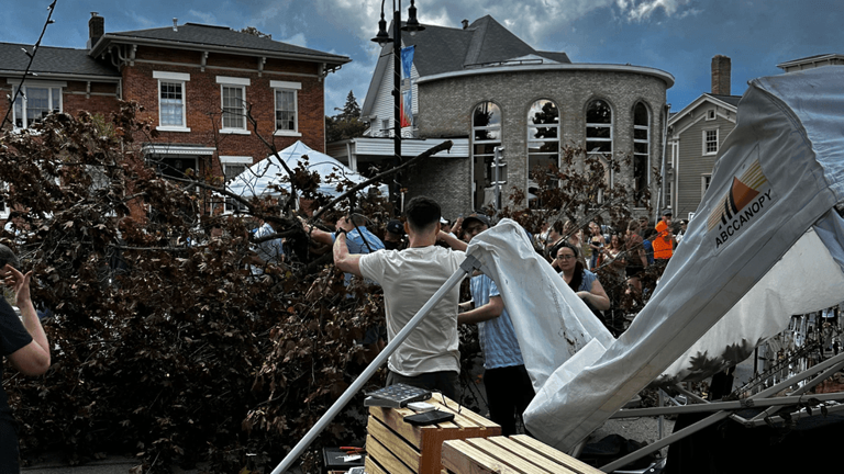 Two people injured after tree branch falls on tent during Fairport ...