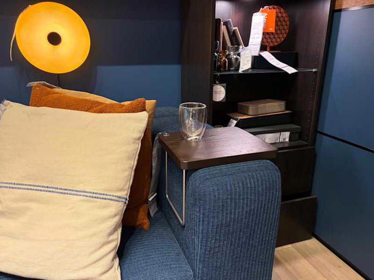 This clever $20 IKEA find creates a side table out of thin air