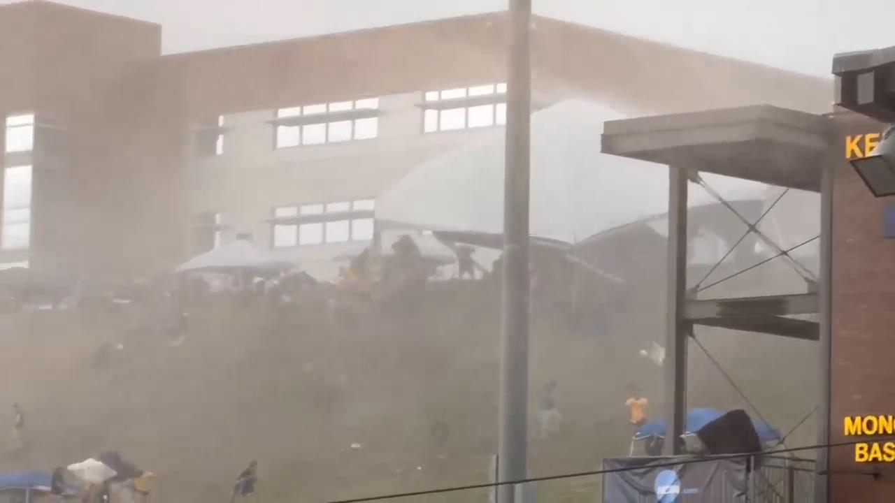 Footage captures severe winds collapsing a large tent in West Virginia ...