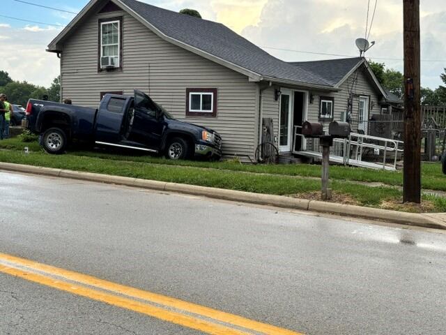 1 person injured after pick-up truck crashes into home in Miami County