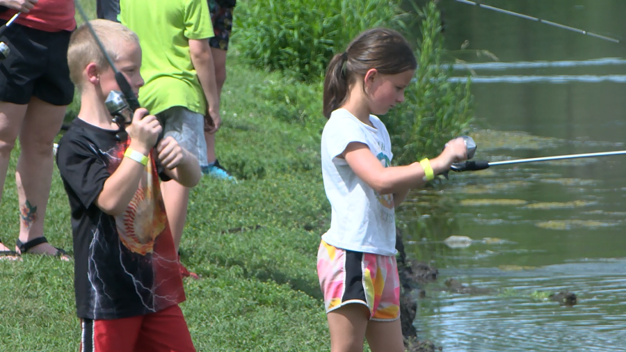 Kids reel in memories at 30th annual River-Cade Youth Fishing Derby