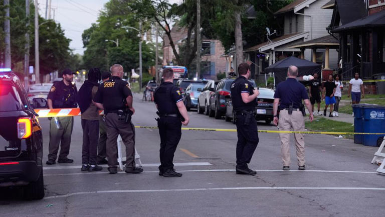Police search for suspects after at least 12 people shot near a ...