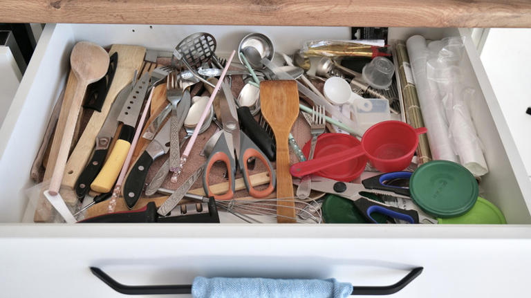 Ditch the clutter: Reuse paper towel rolls for a kitchen utensil ...