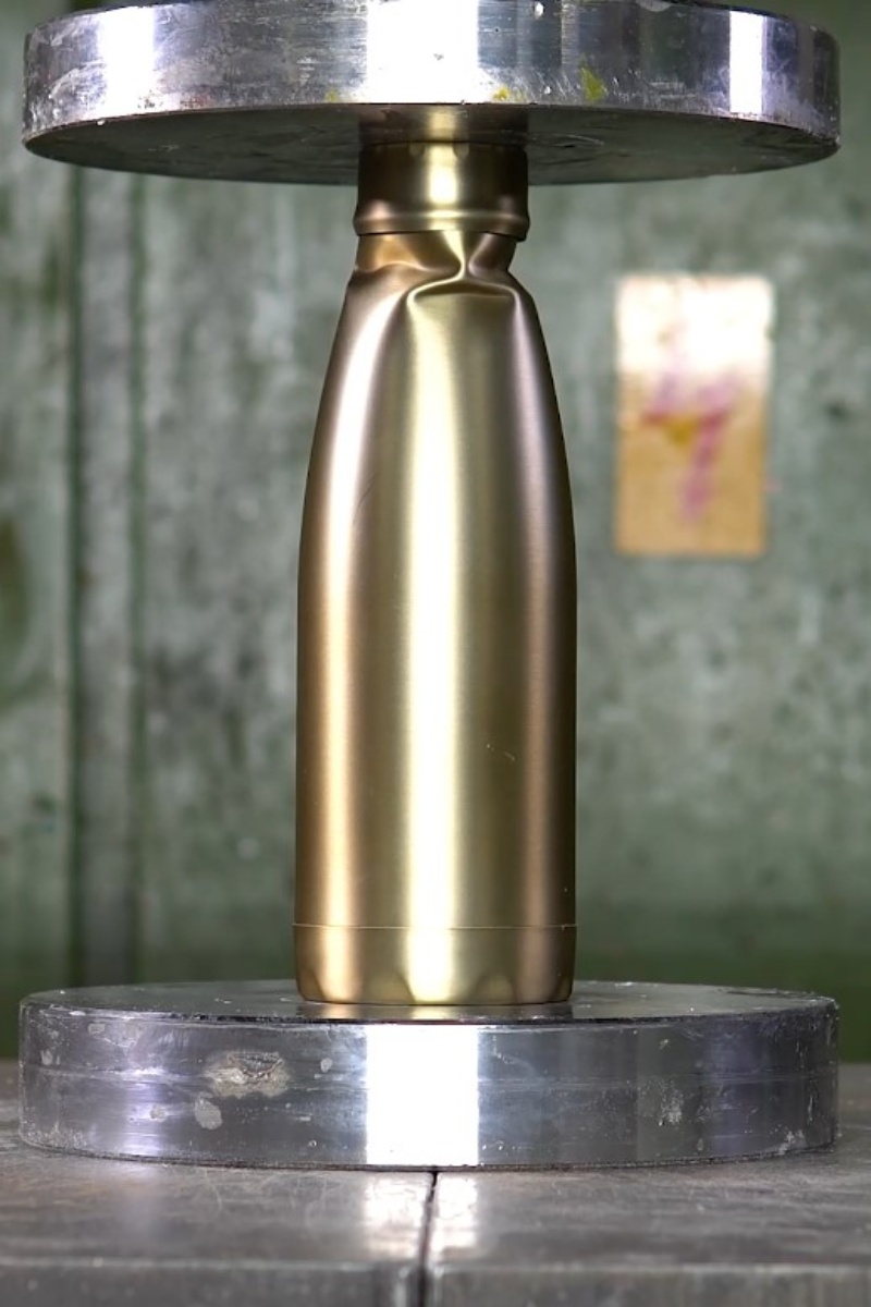 Hydraulic press vs metal bottle