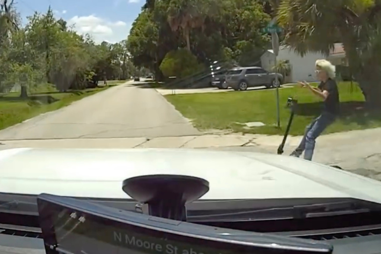 Teen scooter rider hits police vehicle after running stop sign
