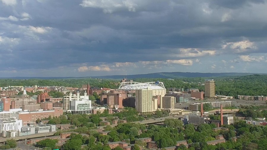 Breezy & cooler, just a few showers today