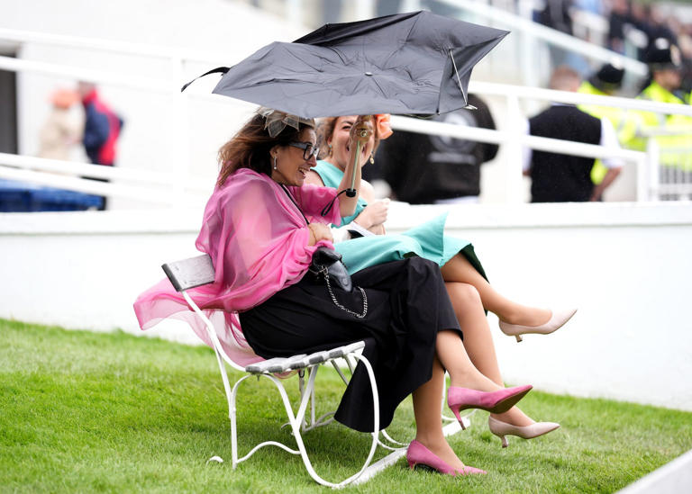 Sunday to be drier as downpours and strong winds batter the UK