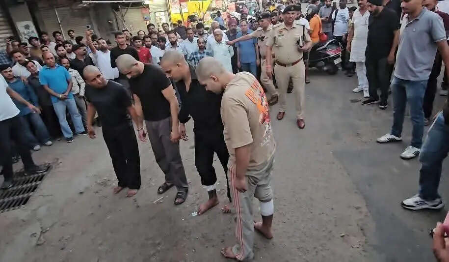 Panchkula police parade four murder accused with shaved heads through ...