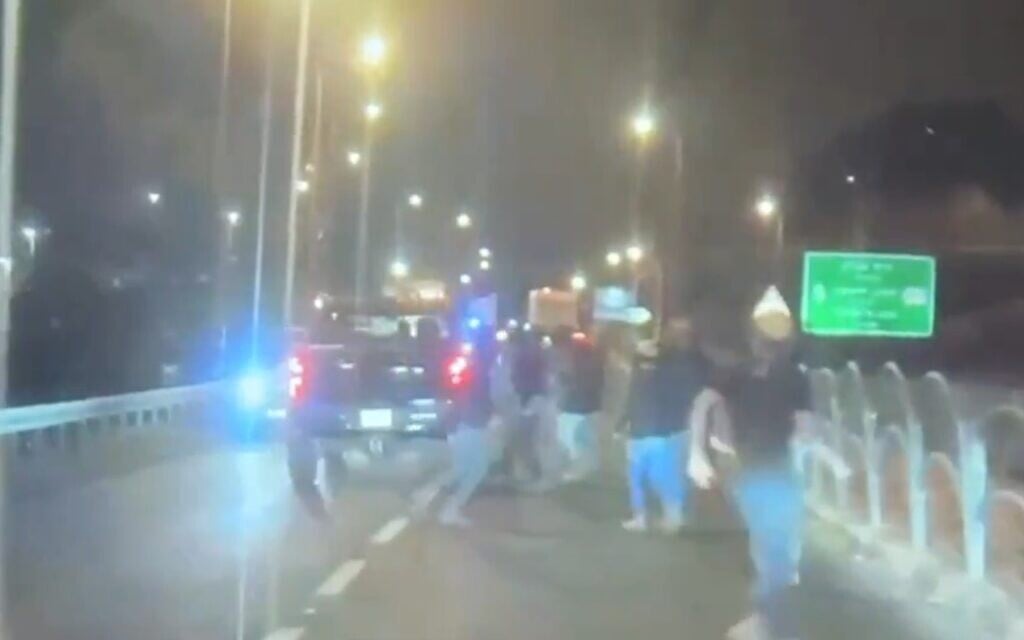 1 lightly hurt as Palestinian car hits settlers who blocked West Bank ...