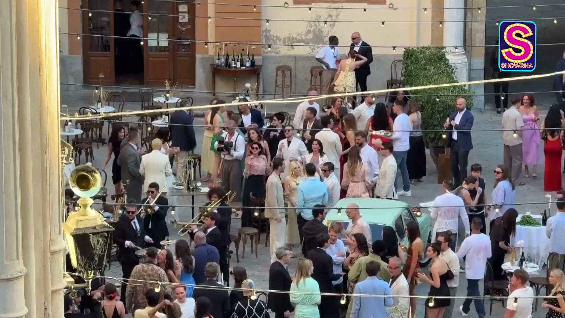 Dua Lipa & Callum Turner look every bit in love at Palermo wedding ...