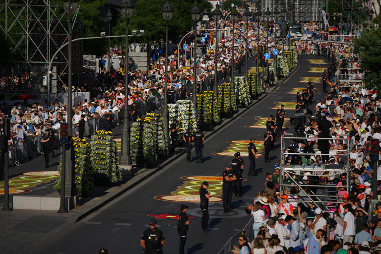 Pope's mass in Spain features iconic procession along flower-carpeted ...