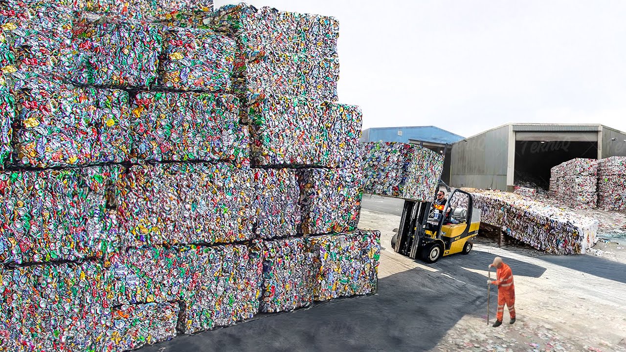 Inside massive recycling facility shredding tons of used soda cans daily
