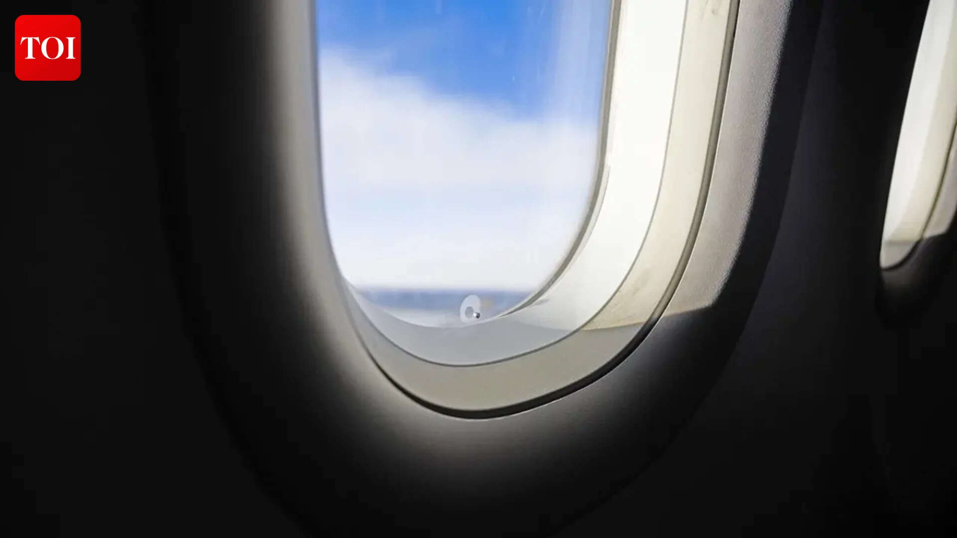 Why do airplane windows have tiny holes? The pressure-balance safety ...