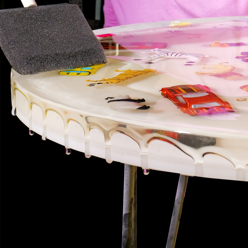 Kids toys on a resin table top! 🧸🚗