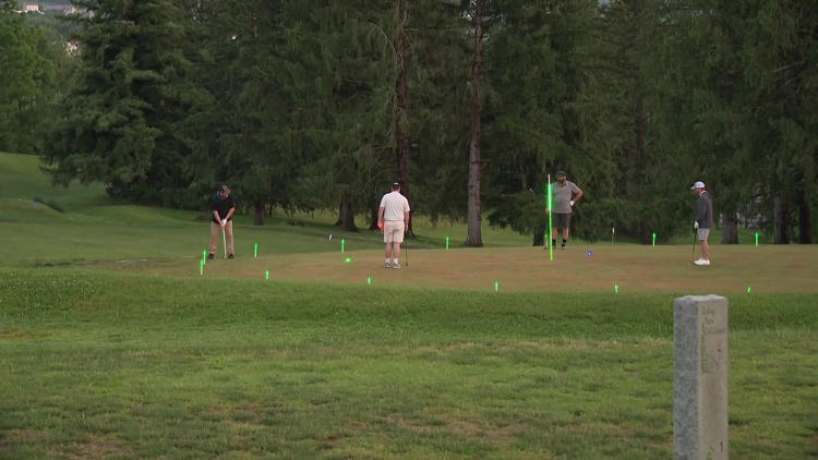 Golfers light up the night to benefit a local police department