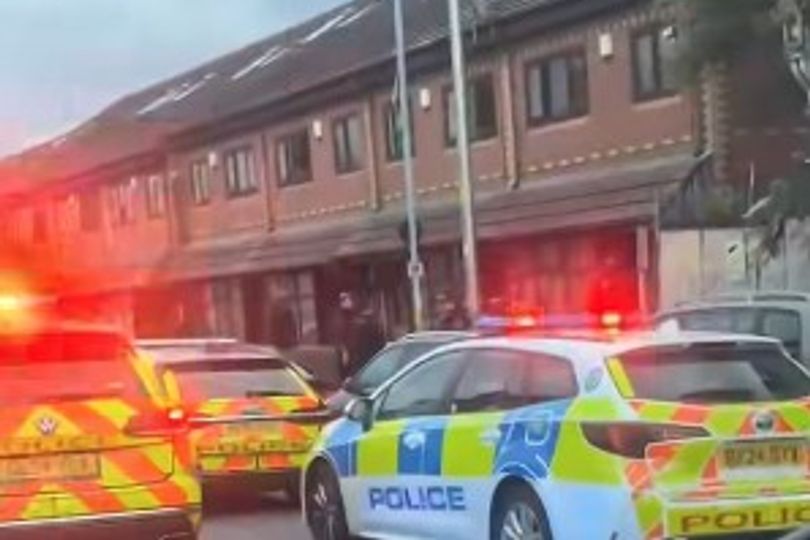 Man injured after 'disagreement' on city street as police hunt suspect